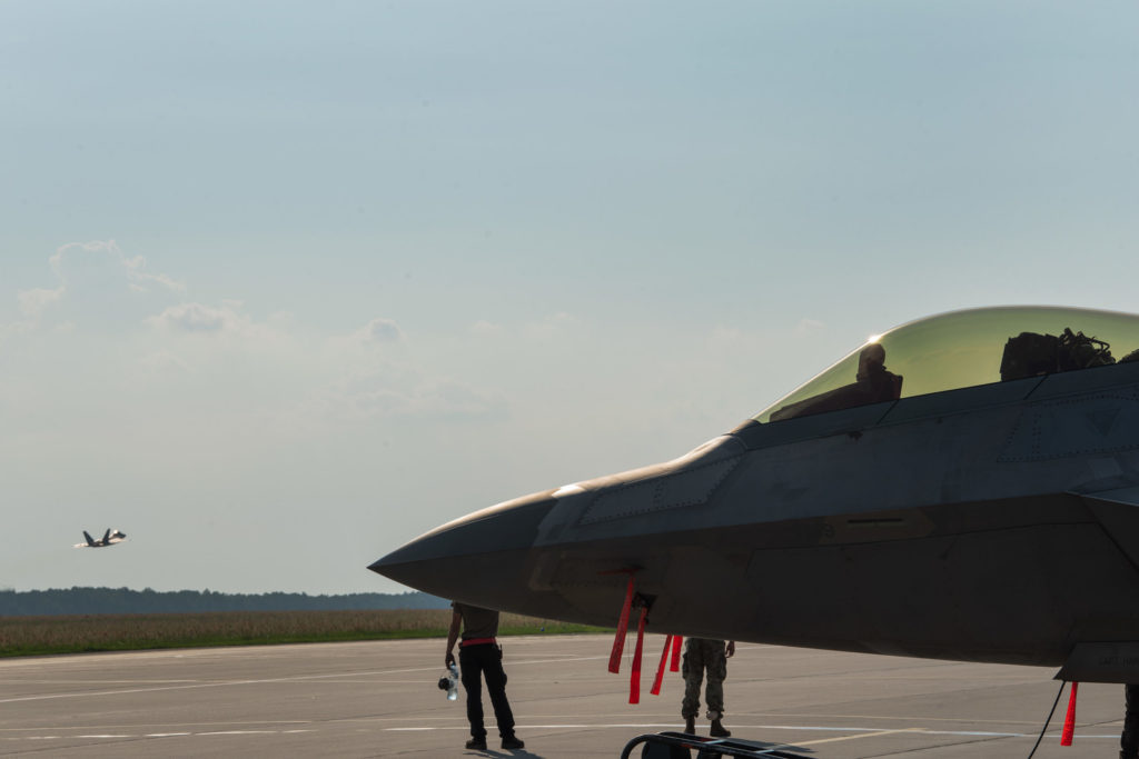 F-22s Leave Poland, Head Home to Alaska After NATO Deployment | Air ...