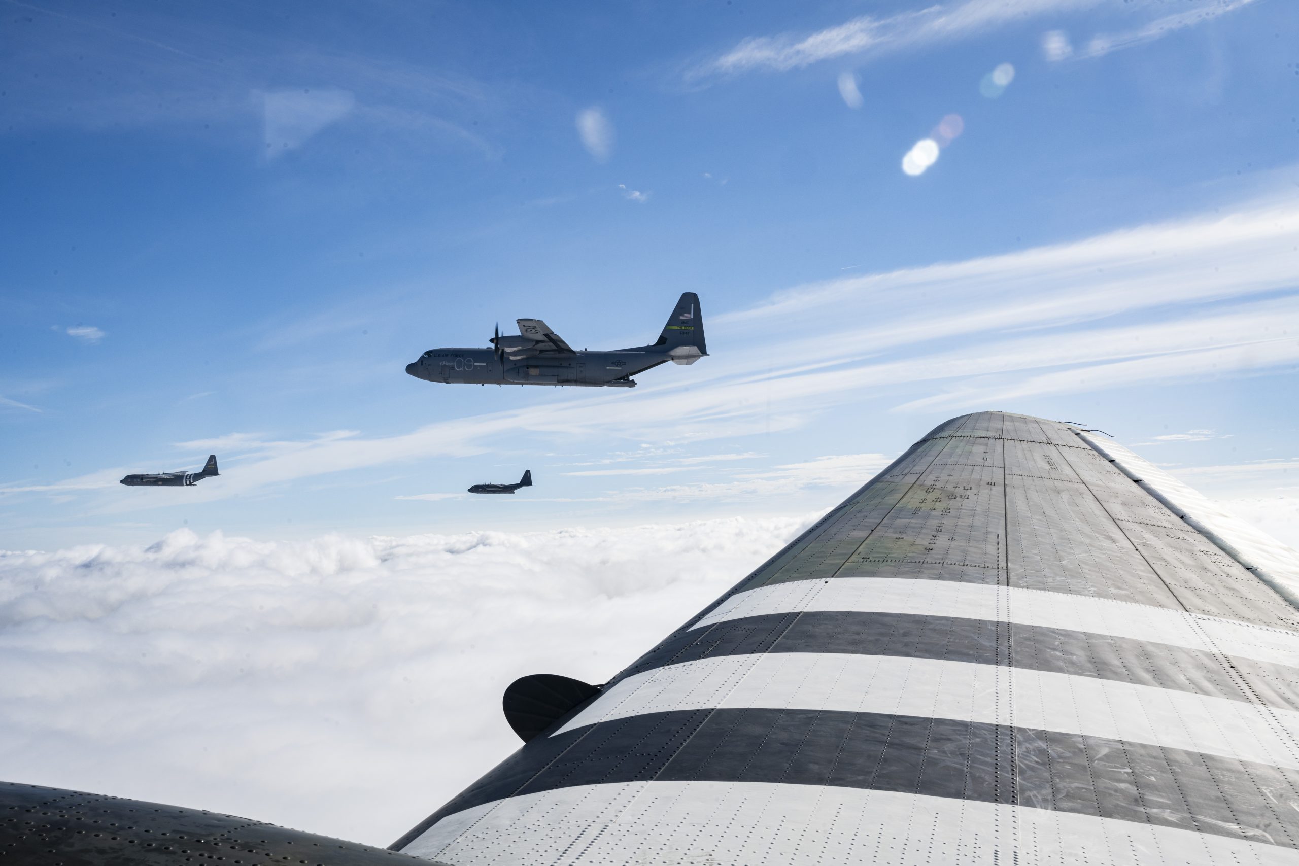 PHOTOS: Invasion-Striped C-130s Fly in D-Day 80th Anniversary