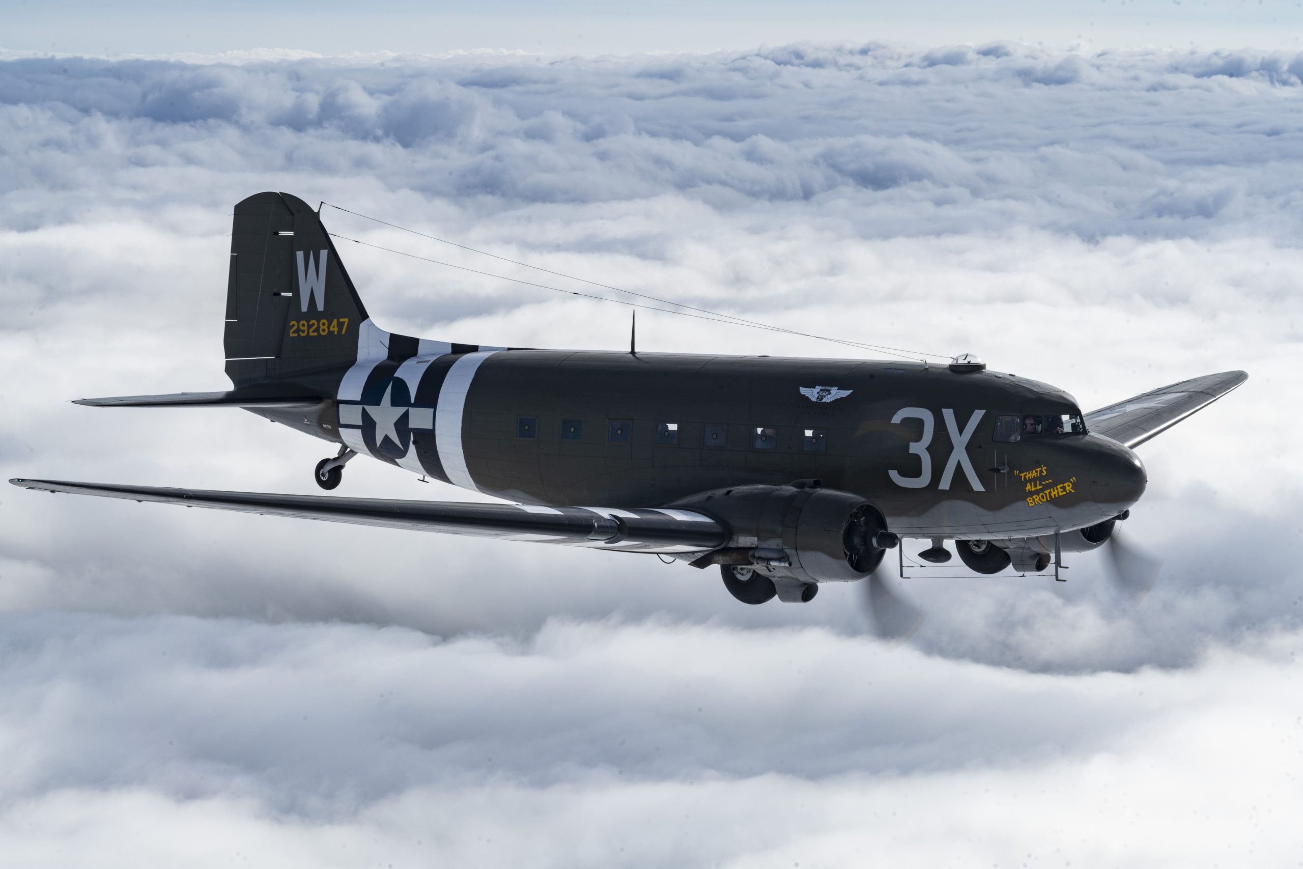 PHOTOS: Invasion-Striped C-130s Fly in D-Day 80th Anniversary