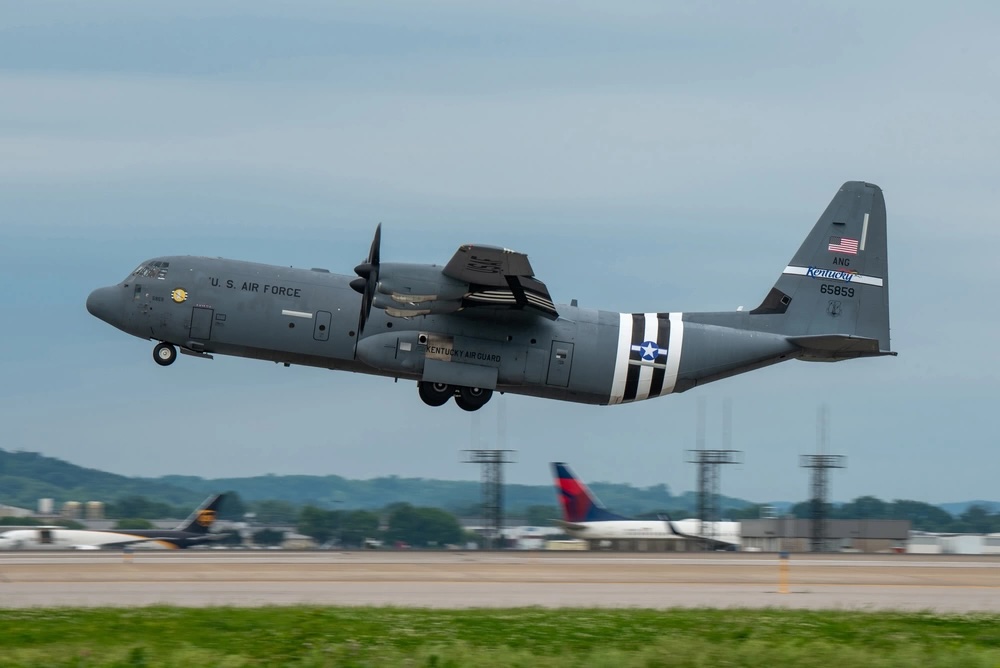PHOTOS: Invasion-Striped C-130s Fly in D-Day 80th Anniversary