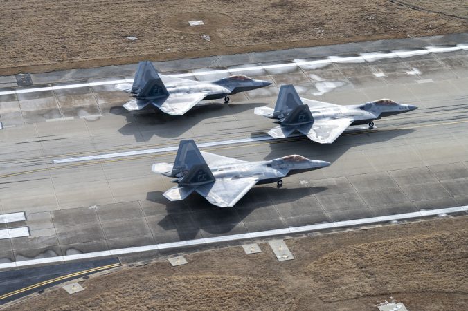 PHOTOS: Two Dozen F-22s Gather for Impressive Elephant Walk